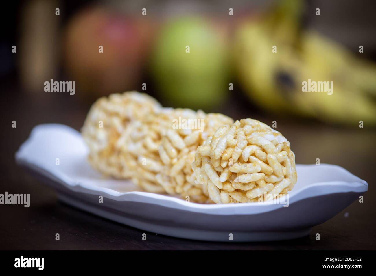View of sweet puffed rice balls(also known as muri, porri) in a bowl ...