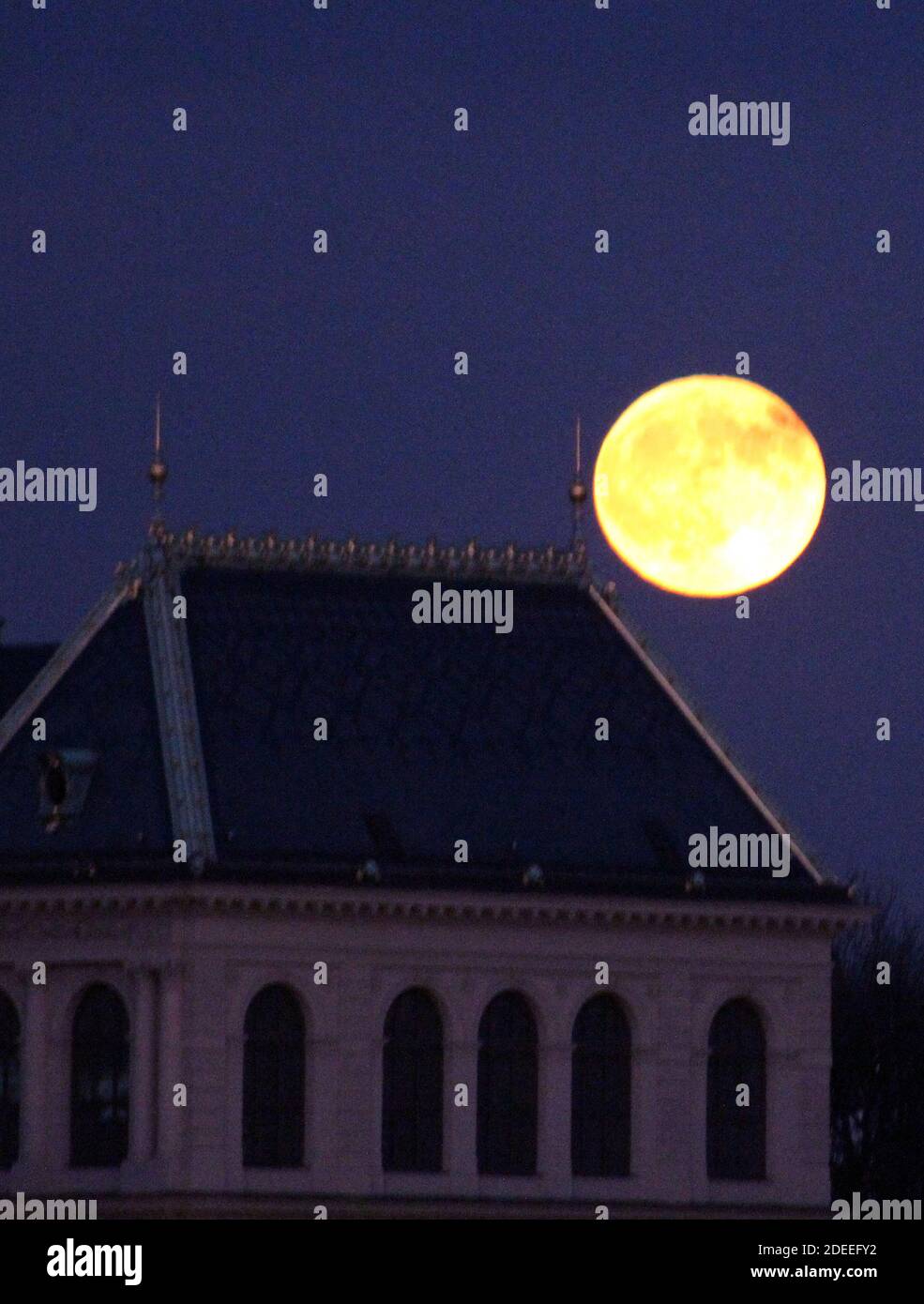 The full moon rises beyond The Museum of Decorative Arts in Prague ...