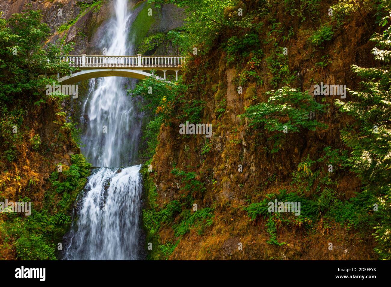 Bridge over waterfall Stock Photo - Alamy