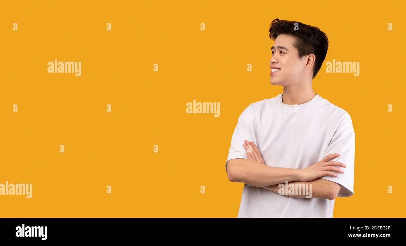 Young asian guy looking camera hi-res stock photography and images - Alamy