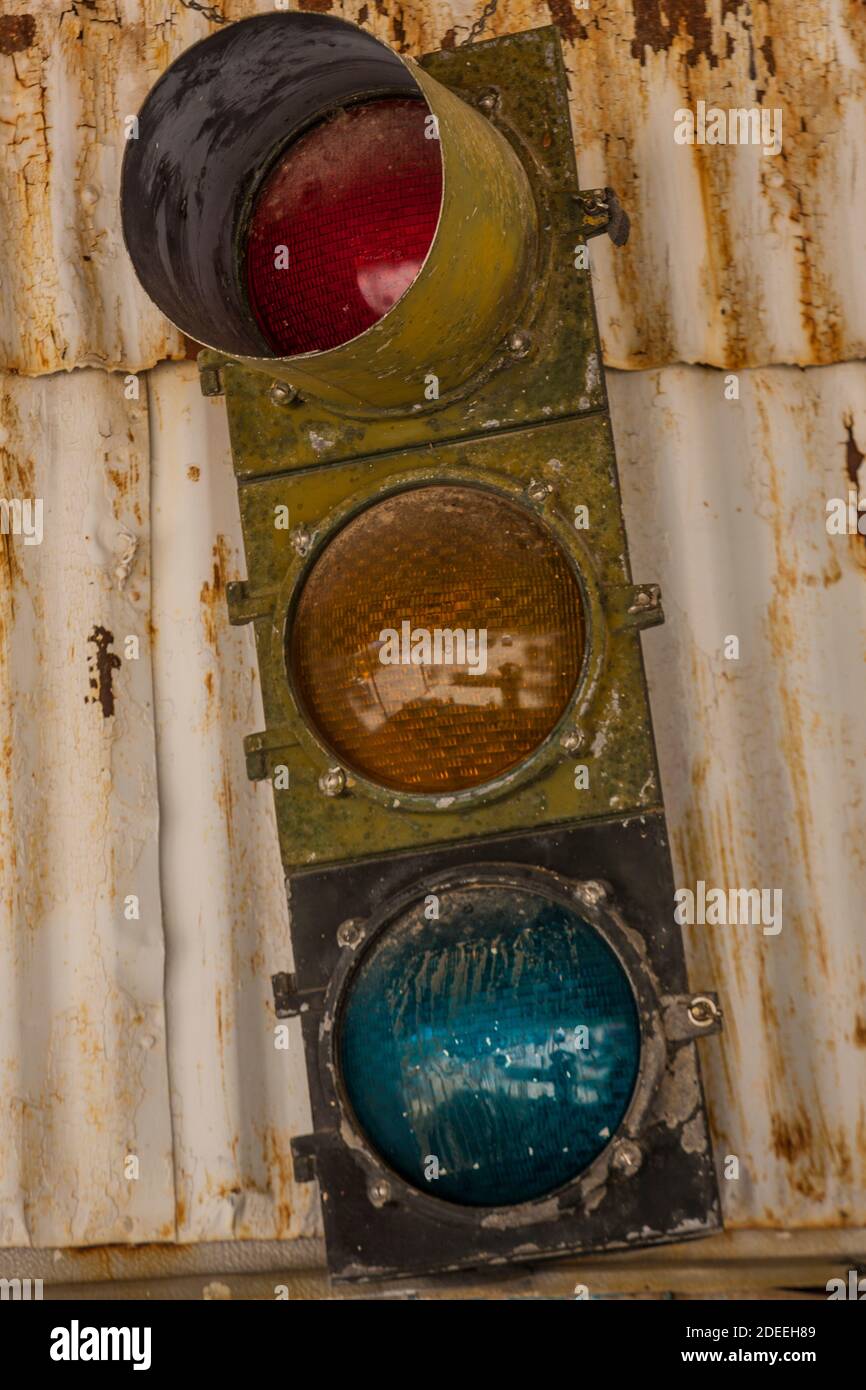 Old traffic light on metal wall Stock Photo - Alamy