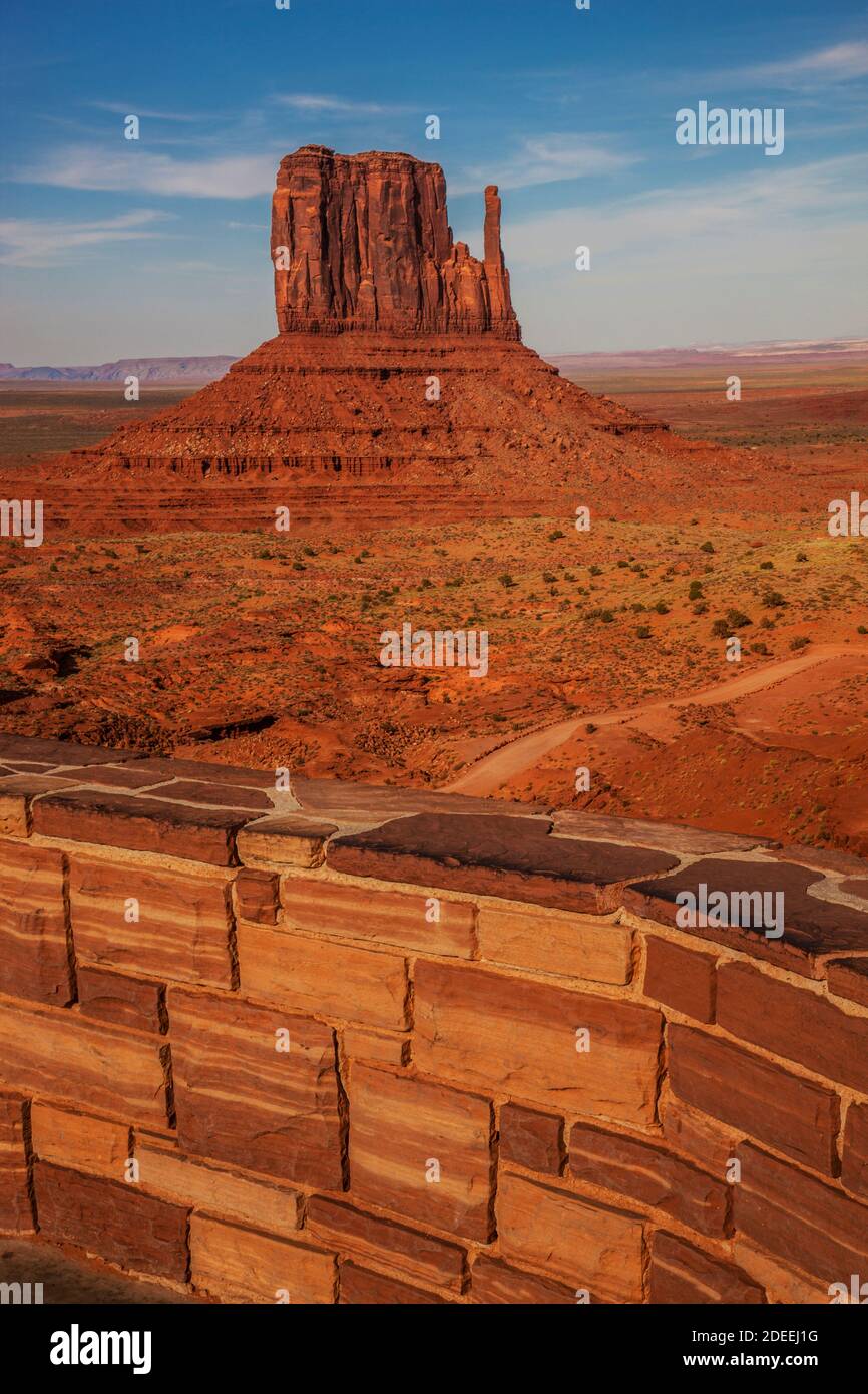 View of Monument Valley with brick wall Stock Photo - Alamy