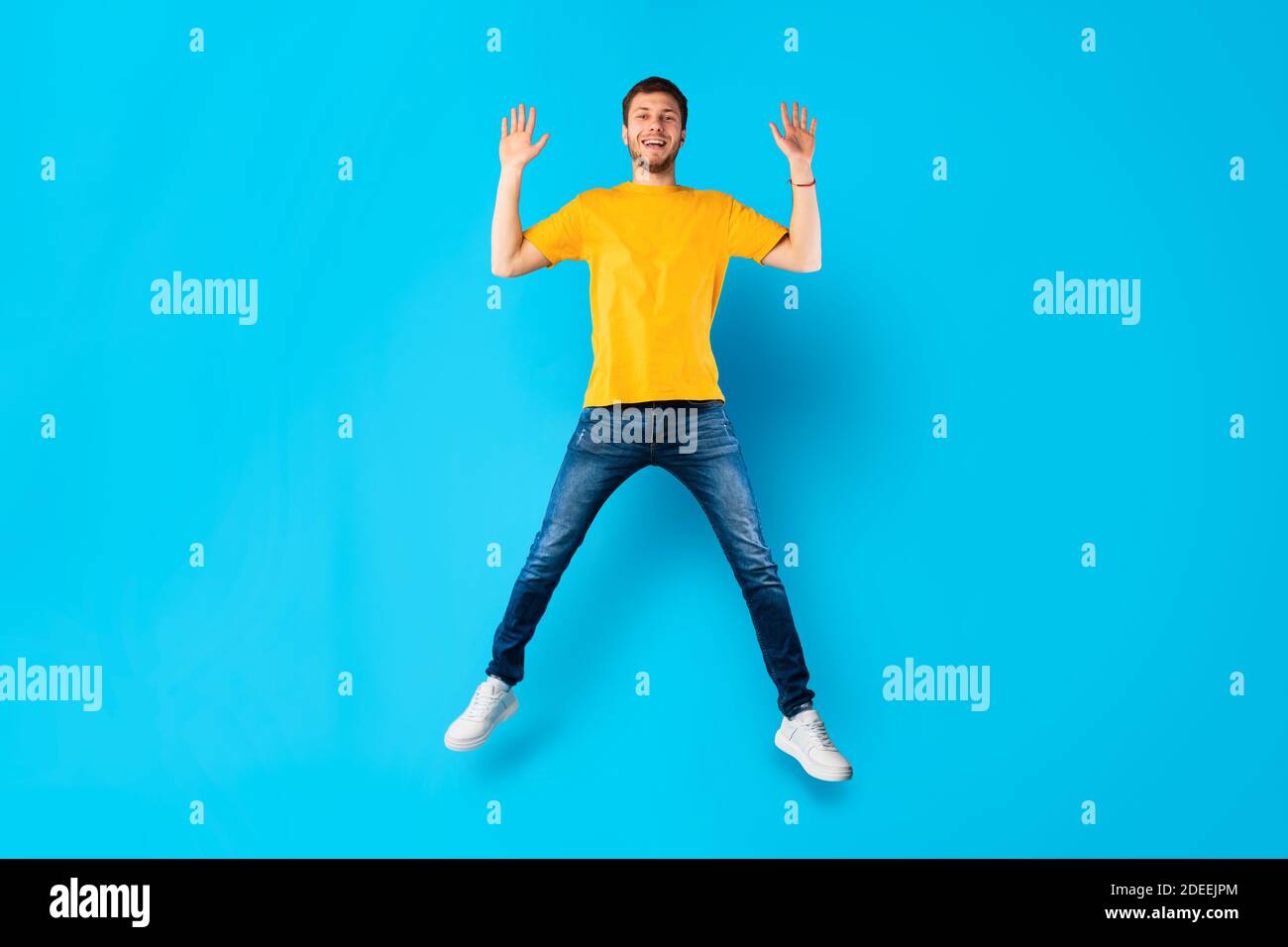 Carefree man jumping over hi-res stock photography and images - Alamy