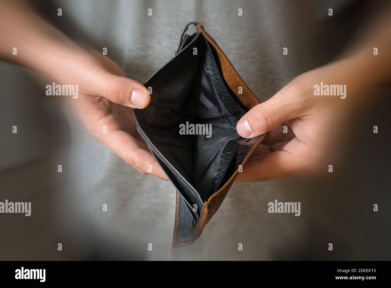 Businessman has no money. Unemployed and bankrupt man looks into his ...