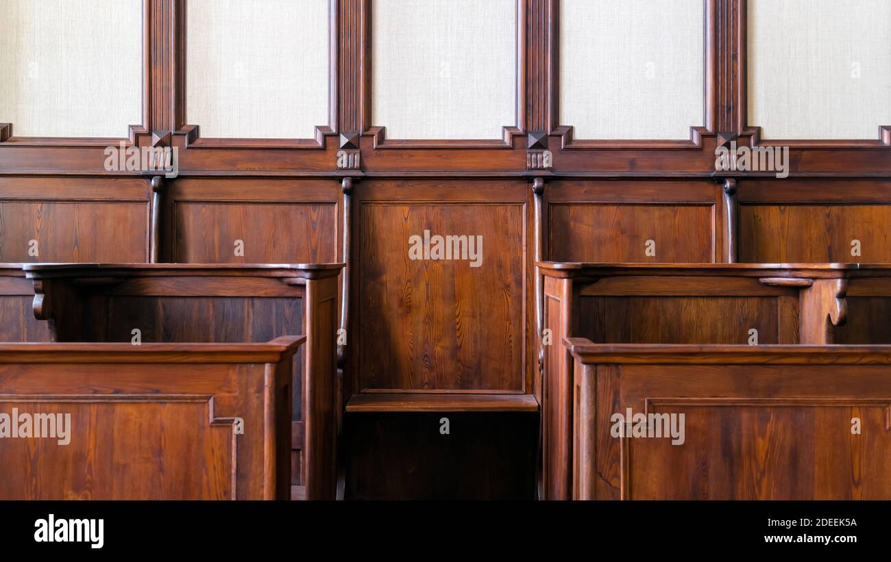 Detail of traditional hard wood courthouse, church choir sitting area ...