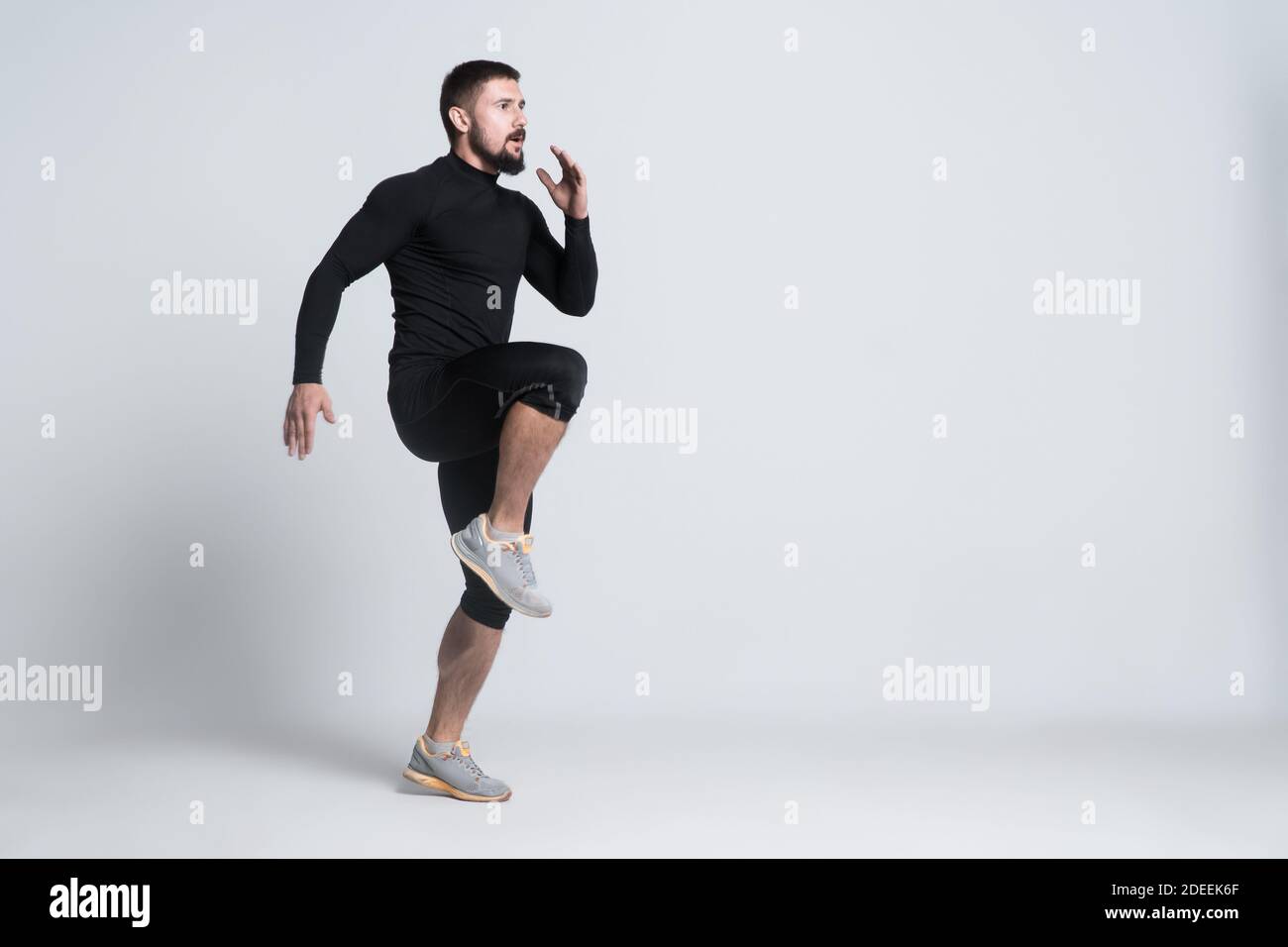 sport man or bodybuilder exercising on white background Stock Photo - Alamy