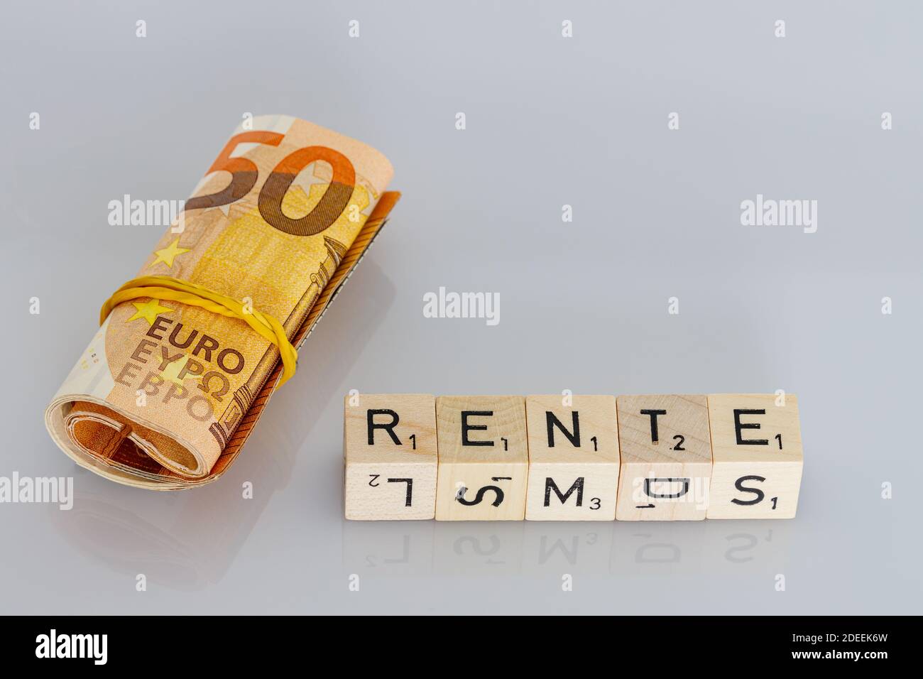Cash Money for retirement on a withe background Stock Photo - Alamy