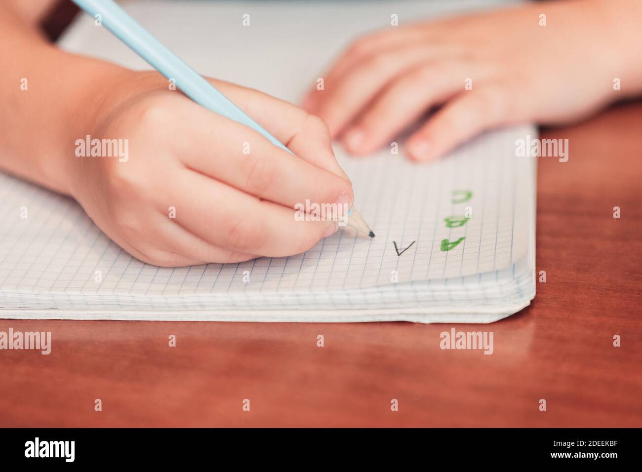 School child writing a letter hi-res stock photography and images - Alamy