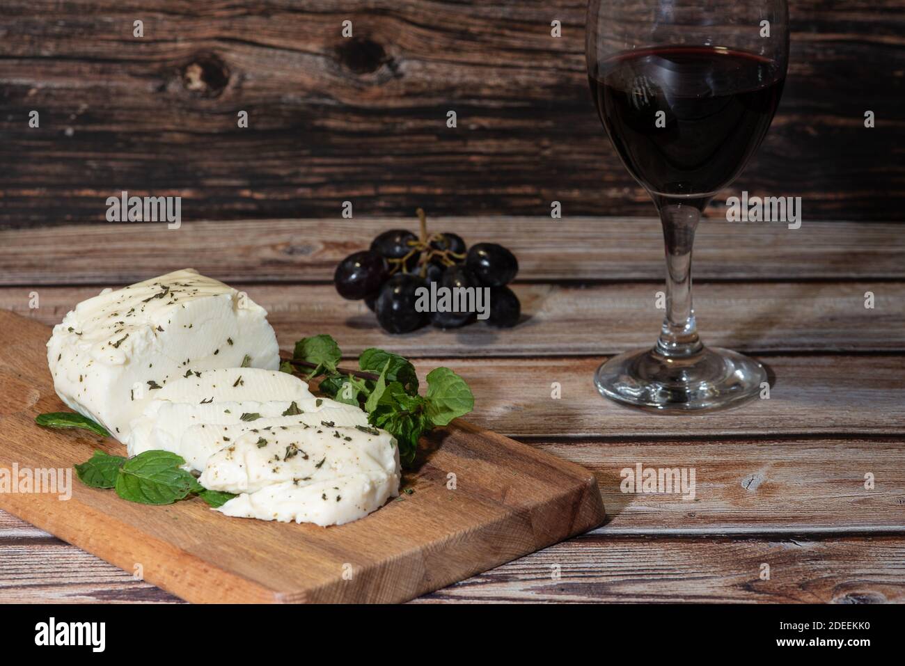 Traditional cyprus halloumi cheese and red wine on a table Stock Photo ...