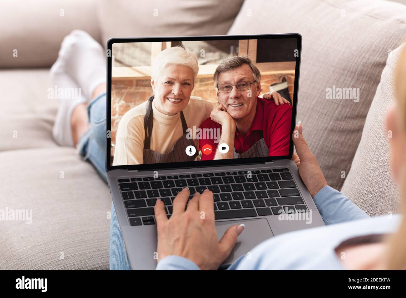 Daughter Making Video Call Talking With Parents Using Laptop Indoors ...
