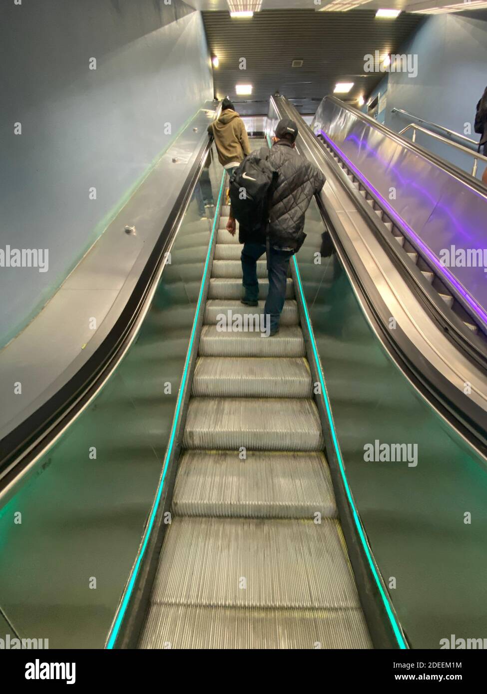 Colorful escalator at Penn Station in New York City Stock Photo - Alamy