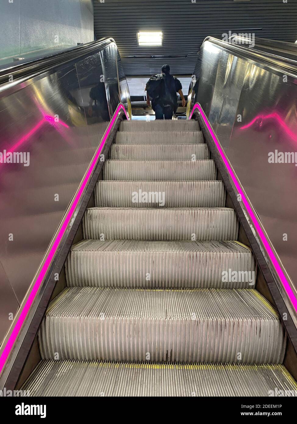 Colorful escalator at Penn Station in New York City Stock Photo - Alamy