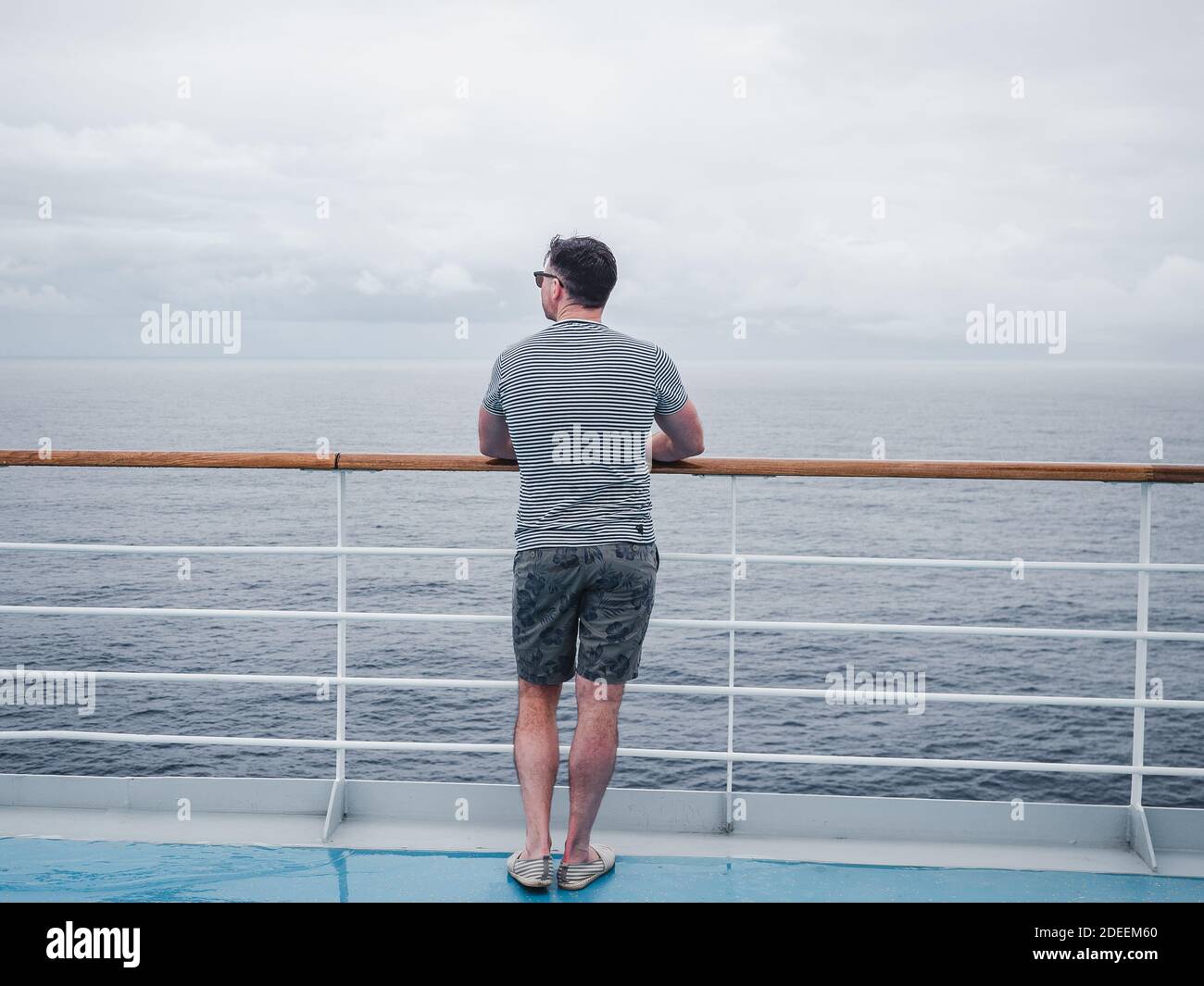 Back Of Man Standing On Deck Of Ship High Resolution Stock Photography ...