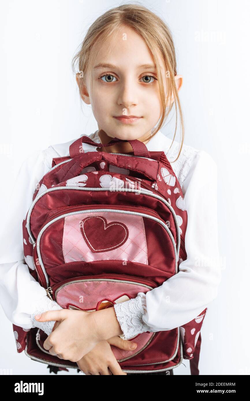 little beautiful schoolgirl girl, with briefcase, white background ...