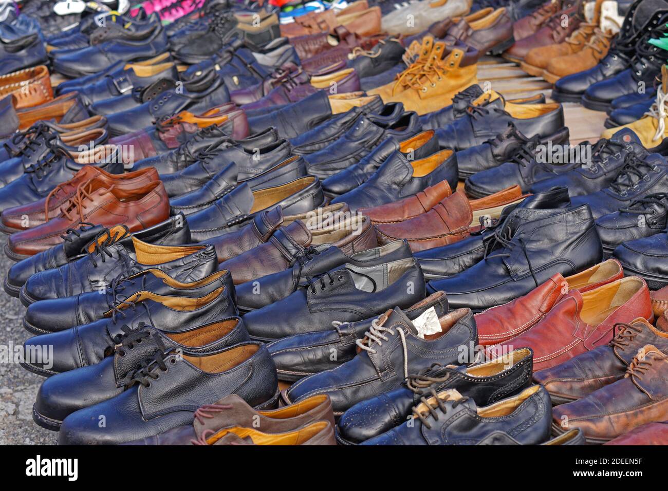 Second hand leather men shoes for sale at flea market Stock Photo - Alamy
