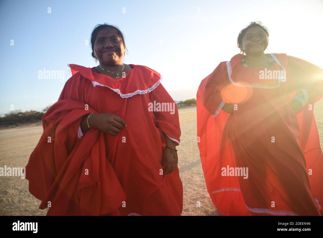 Wayuu indigenous women wearing traditional red costume, La Guajira ...