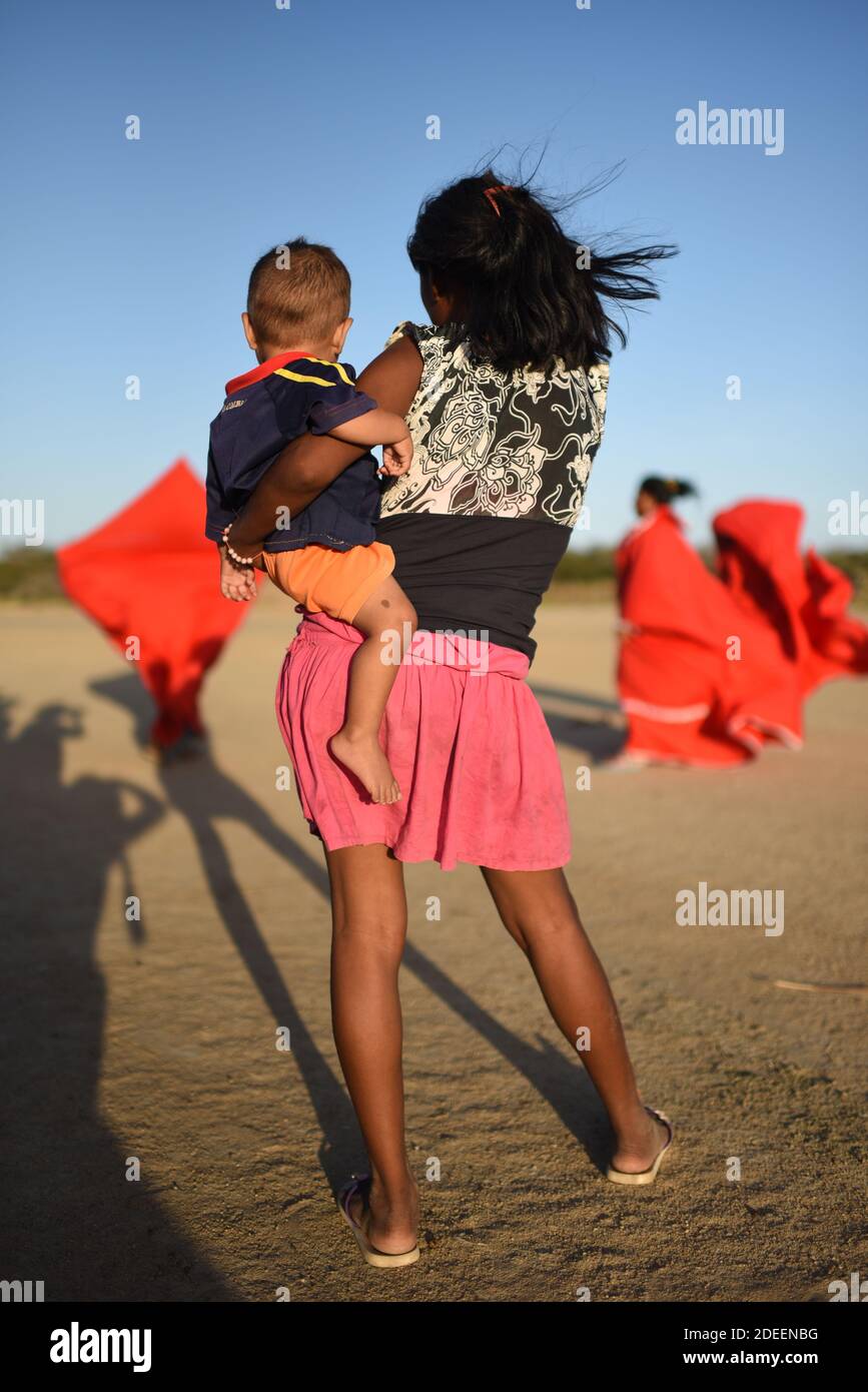 Wayuu indigenous mother holding daughter, La Guajira, Colombia Stock ...