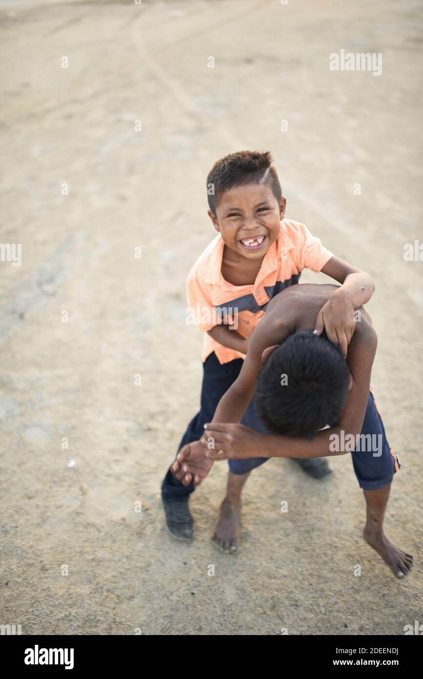 Wayuu indigenous kids in La Guajira, Colombia Stock Photo - Alamy