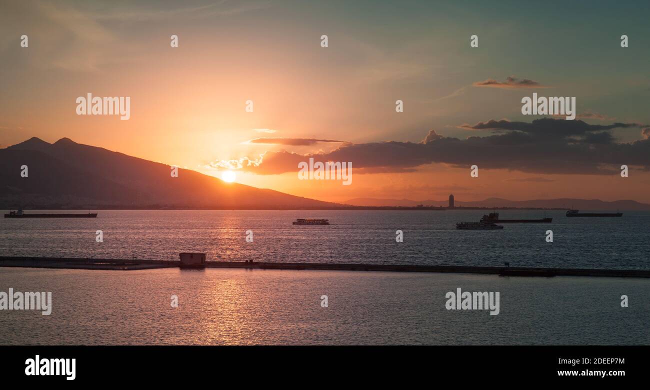 Dramatic colorful sunset. Landscape of Izmir bay, Turkey Stock Photo ...