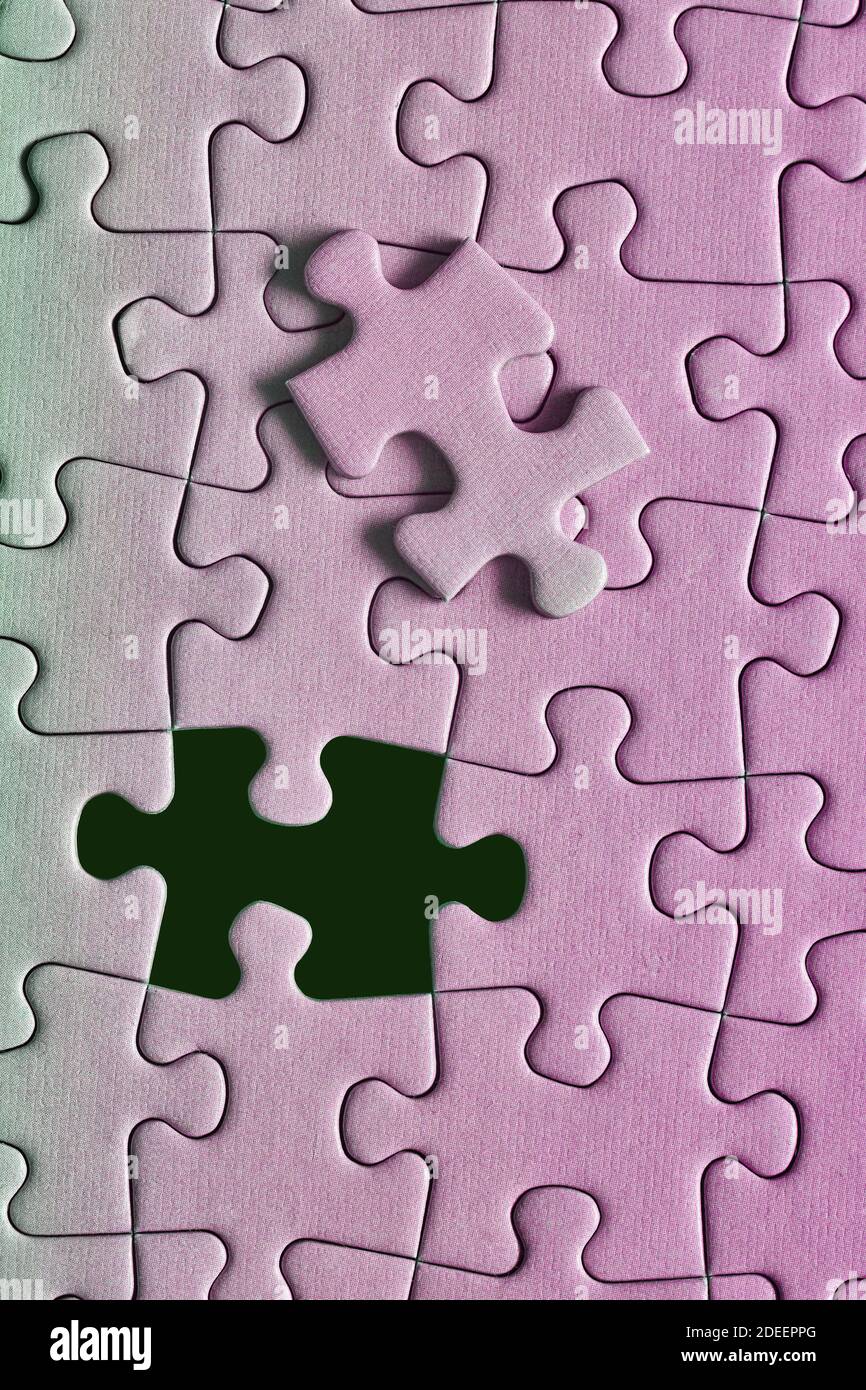Jigsaw puzzle background, almost done Stock Photo - Alamy