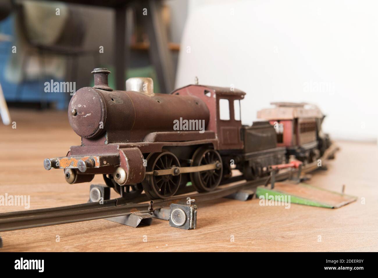 Vintage miniature locomotive at the floor Stock Photo - Alamy