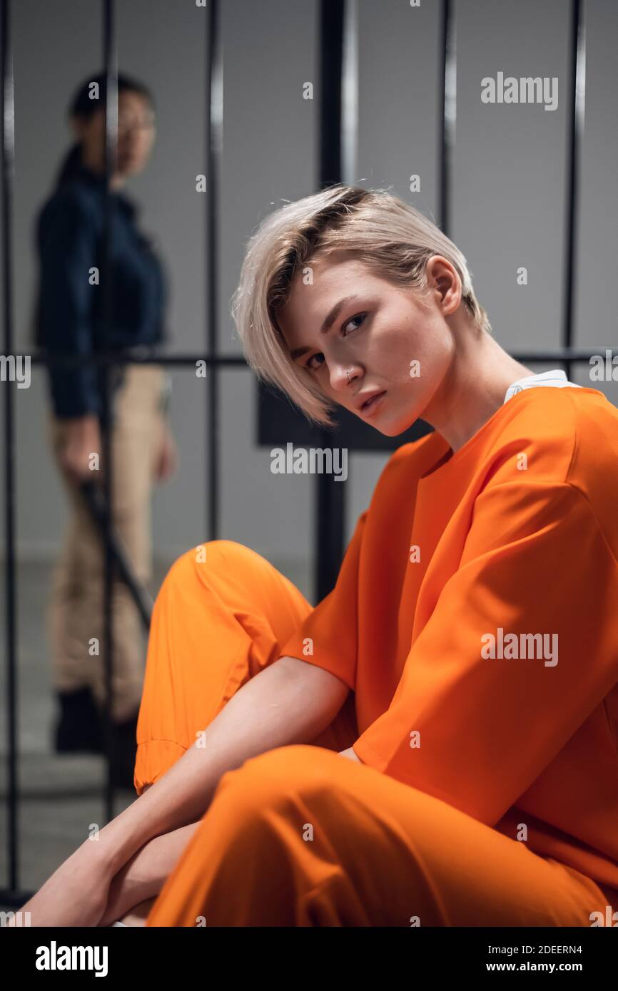 Female prison inmate in cell hi-res stock photography and images - Alamy