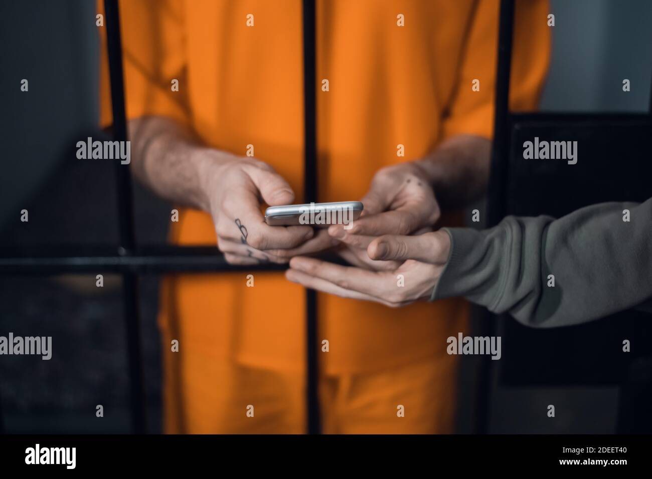 The criminal in the prison cell received a smartphone to communicate ...