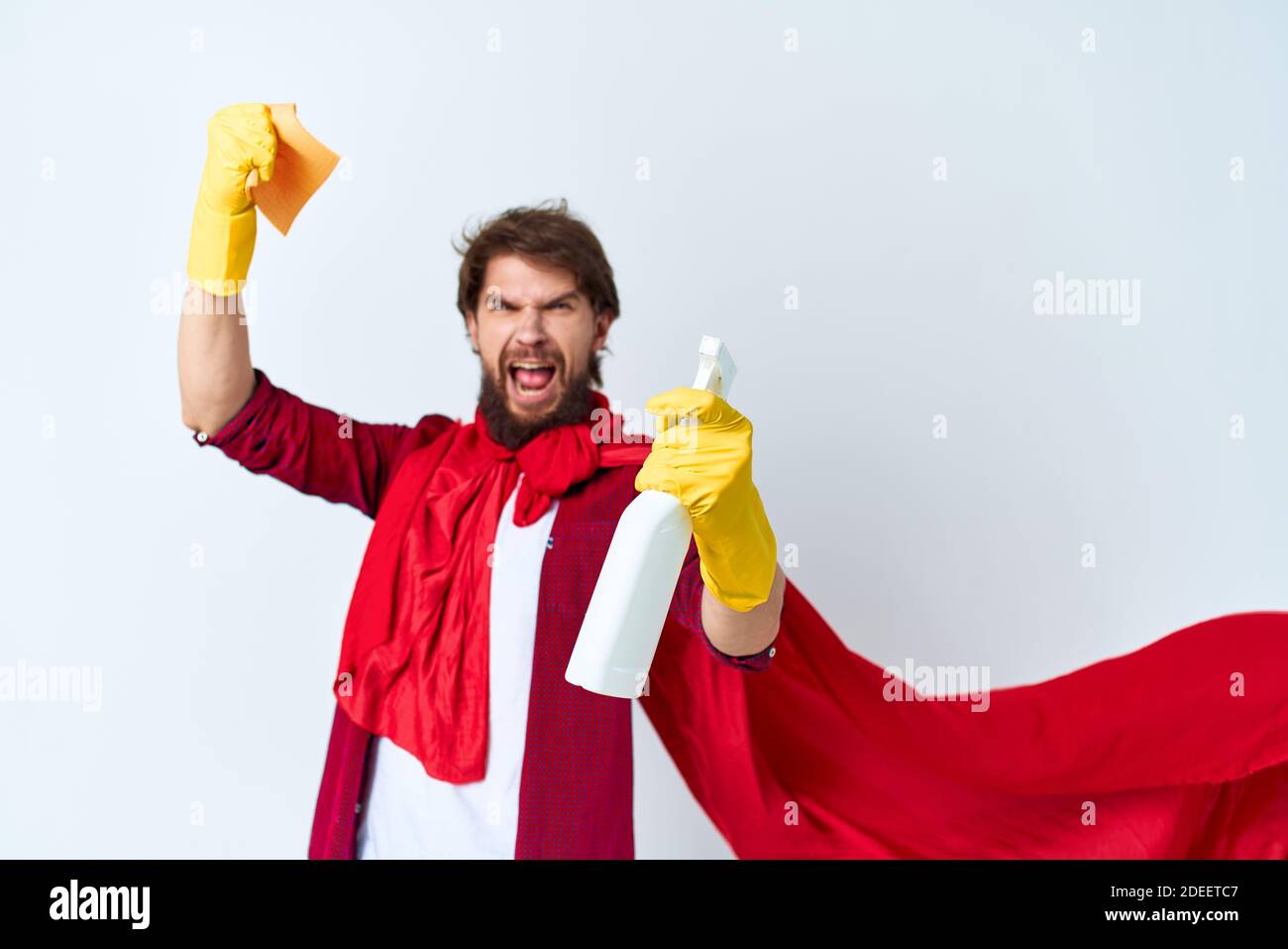 cleaner wearing a red coat detergent service housework cropped view ...