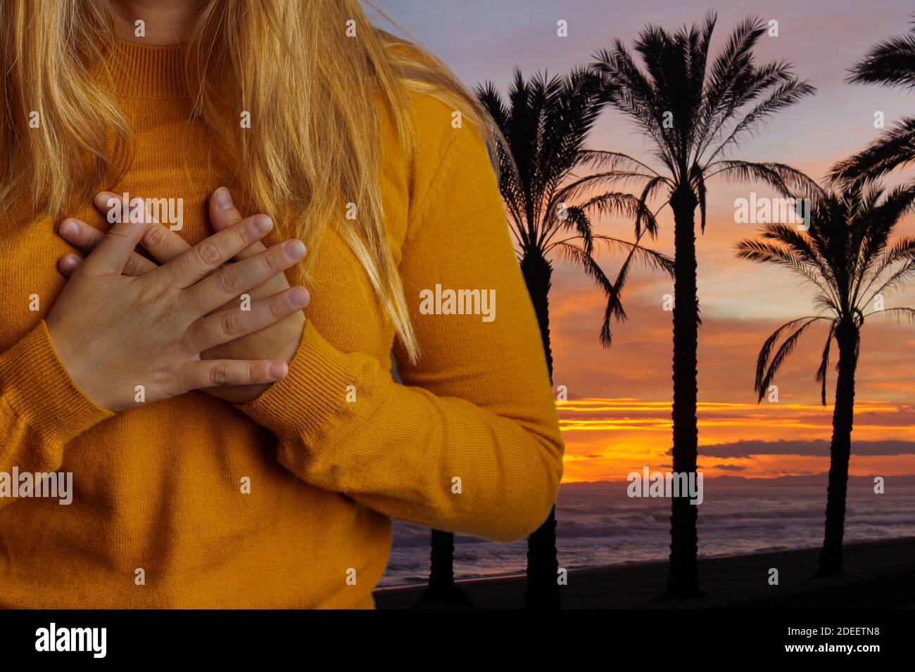 Hands to chest hi-res stock photography and images - Alamy