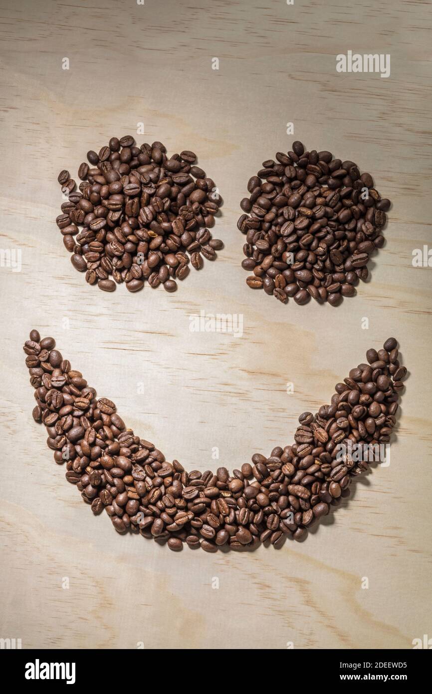 Smile face of coffee beans Stock Photo - Alamy