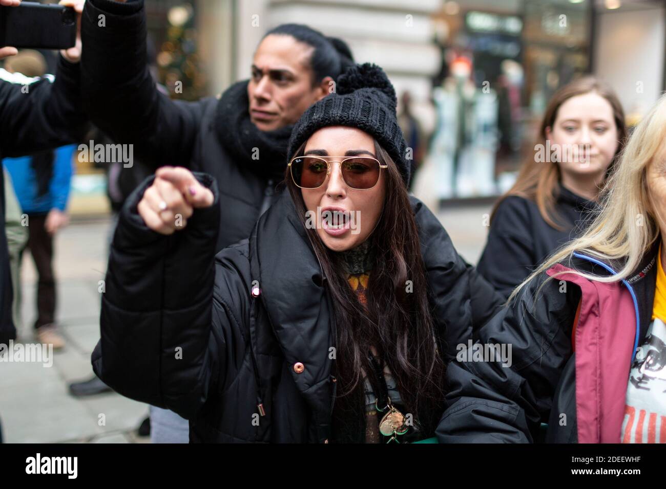 Anti-lockdown protest, Regent Street, London, 28 November 2020. A girl ...
