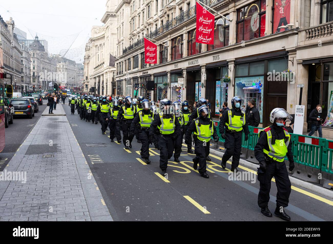 Anti-lockdown protest, London, 28 November 2020. Police officers in ...