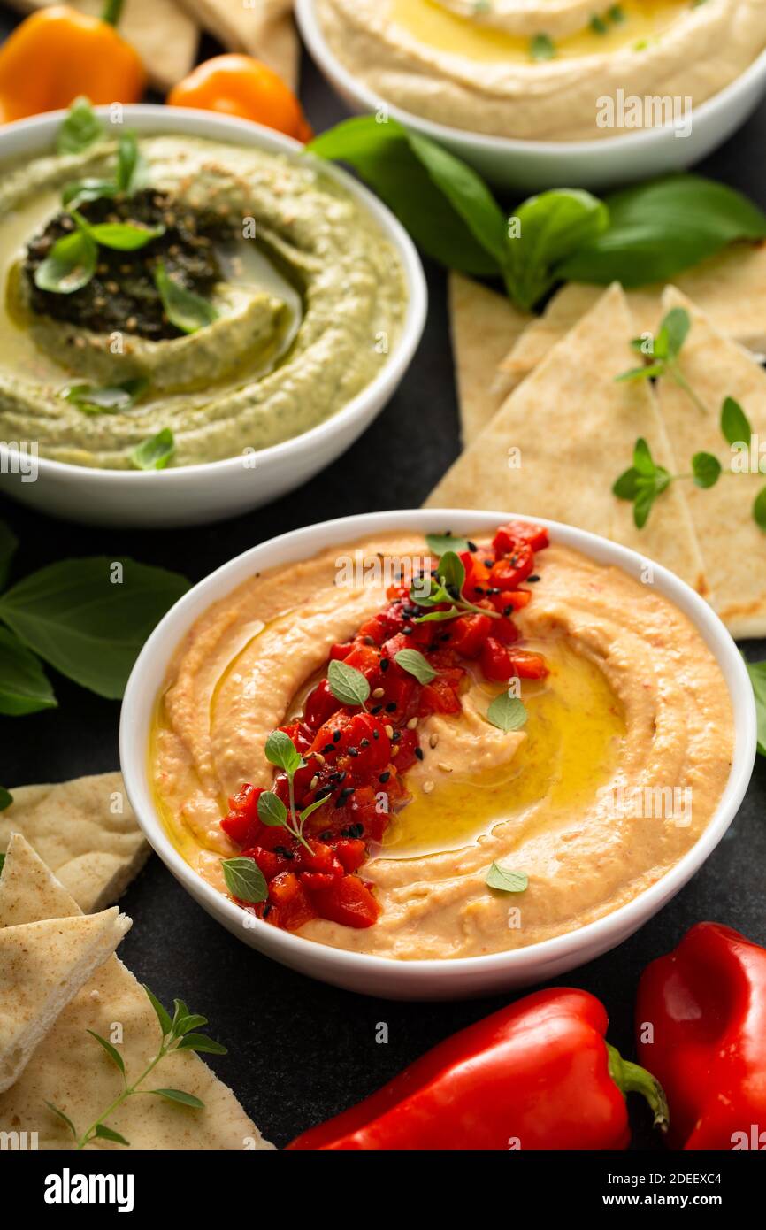 Hummus board with pita Stock Photo - Alamy