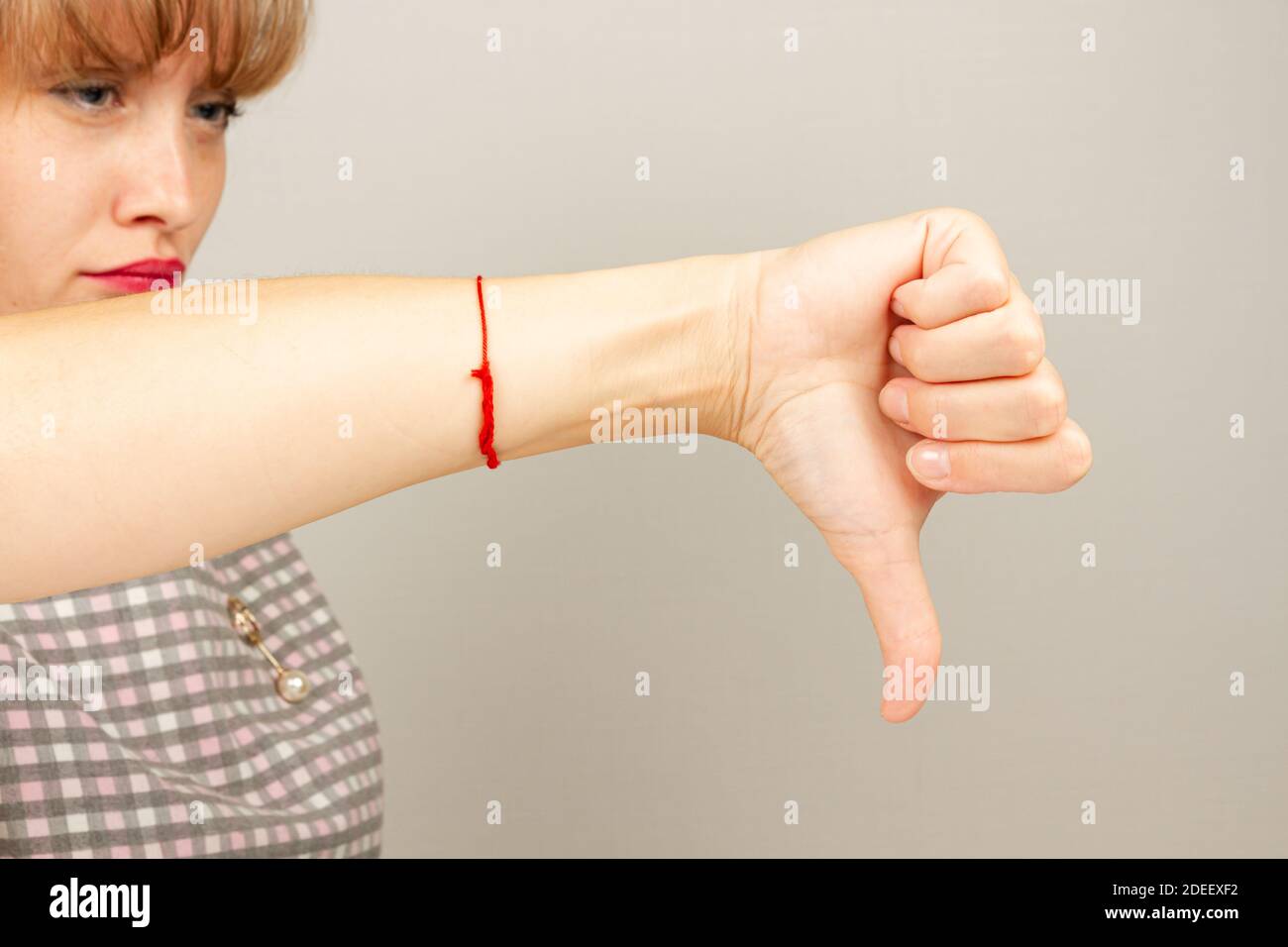 beautiful girl showing signs with her hands Stock Photo - Alamy