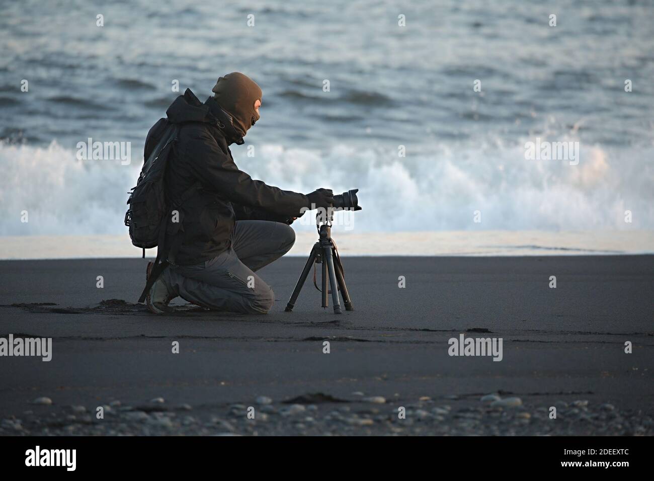 Photographer with tripod Stock Photo - Alamy