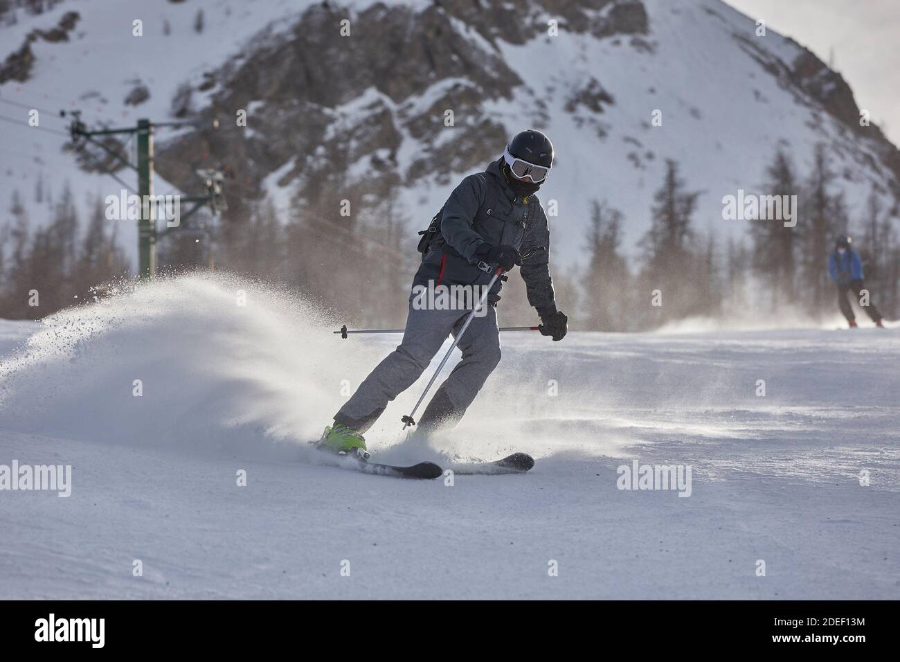 Skiing in the winter snowy slopes Stock Photo - Alamy