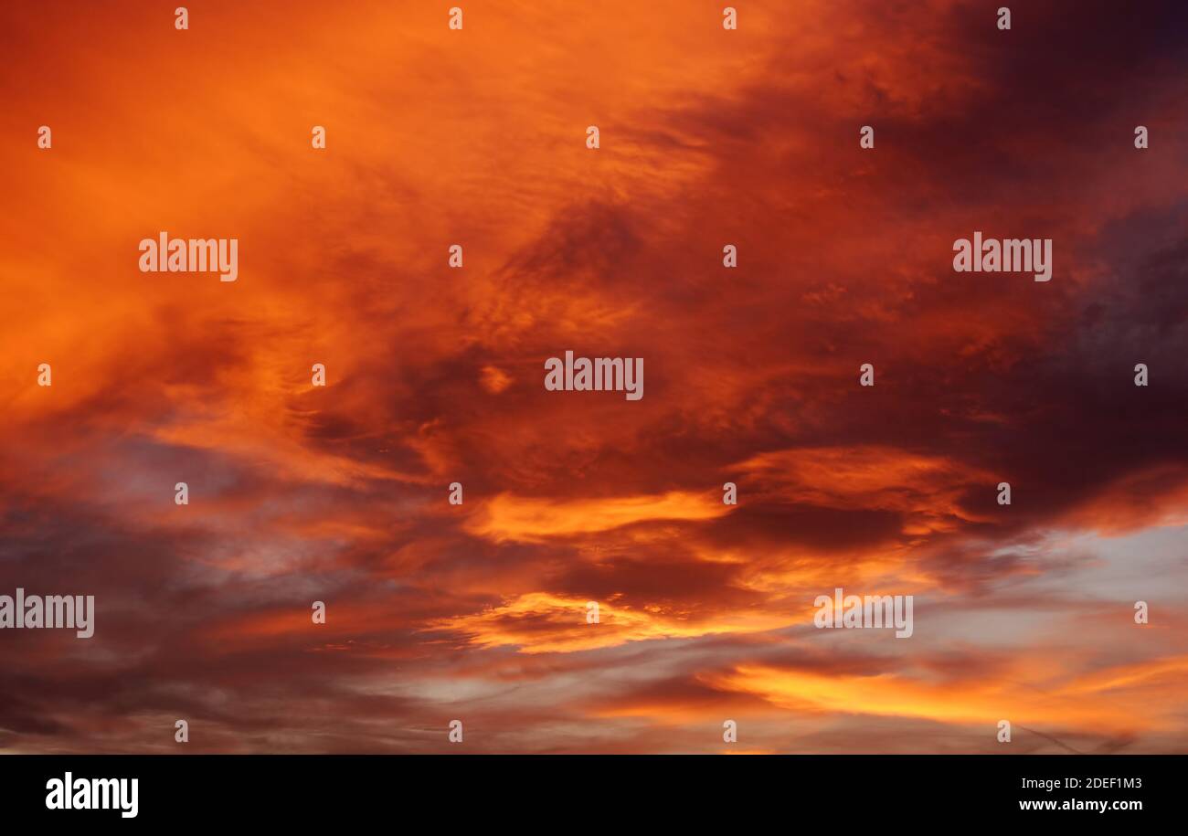 Dark blood red sky background. Dramatic heavy clouds with the hint of ...