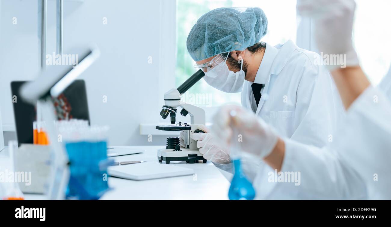 Laboratory microscope group doctors hi-res stock photography and images ...