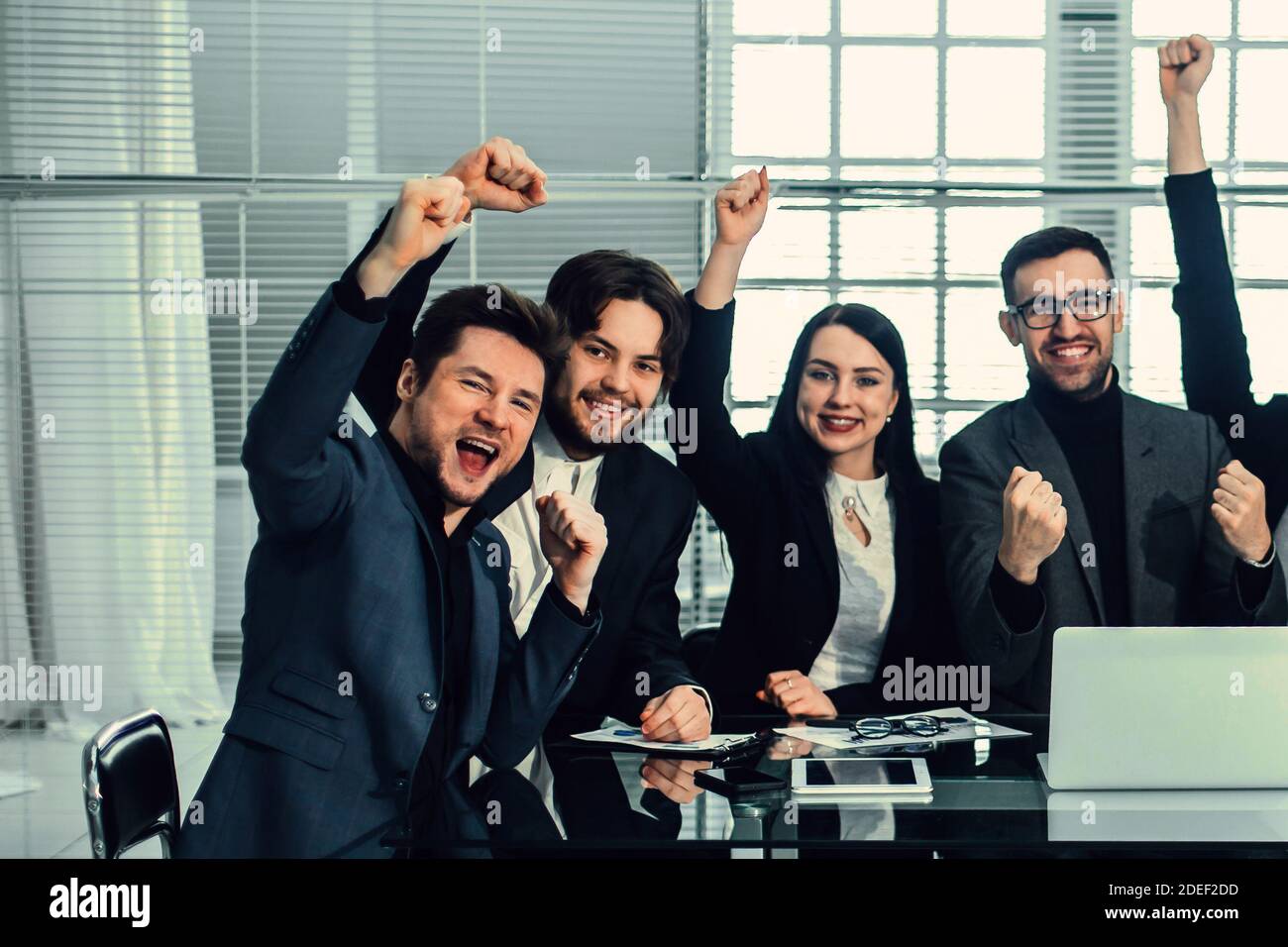 Research team celebrate business success hi-res stock photography and ...