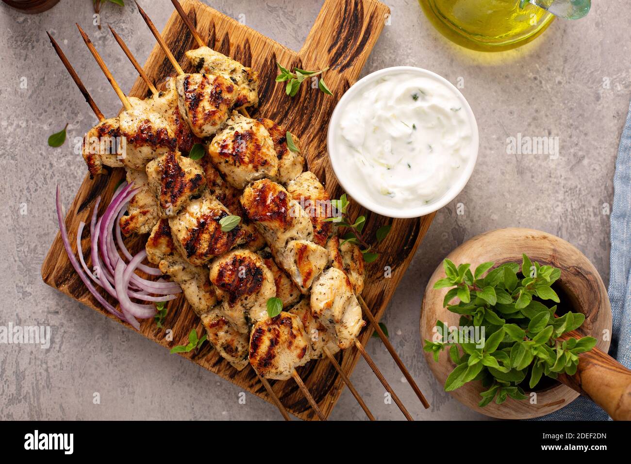 Greek chicken souvlaki with tzatziki Stock Photo - Alamy