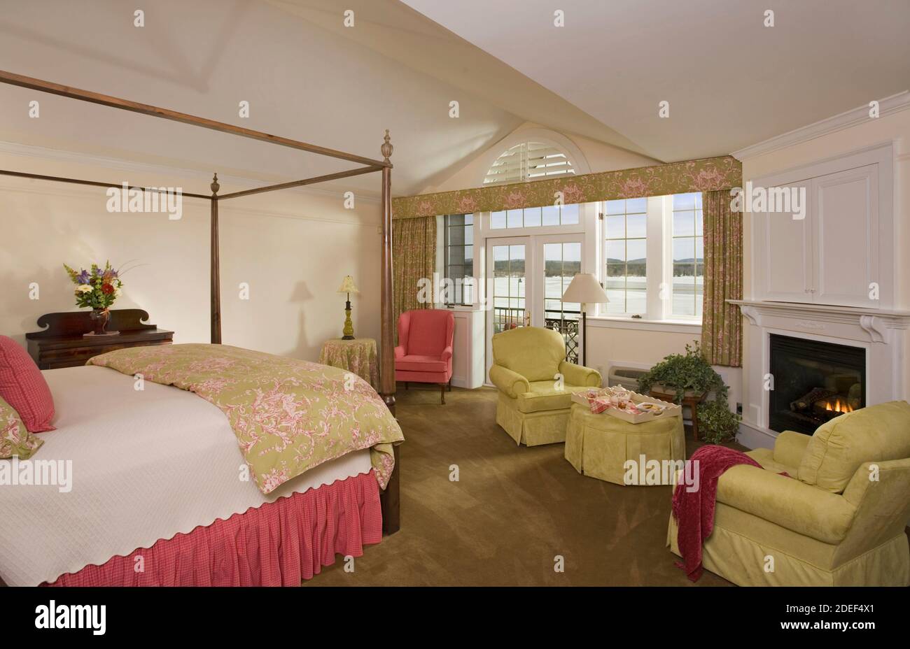 Four poster bed with winter view Stock Photo - Alamy