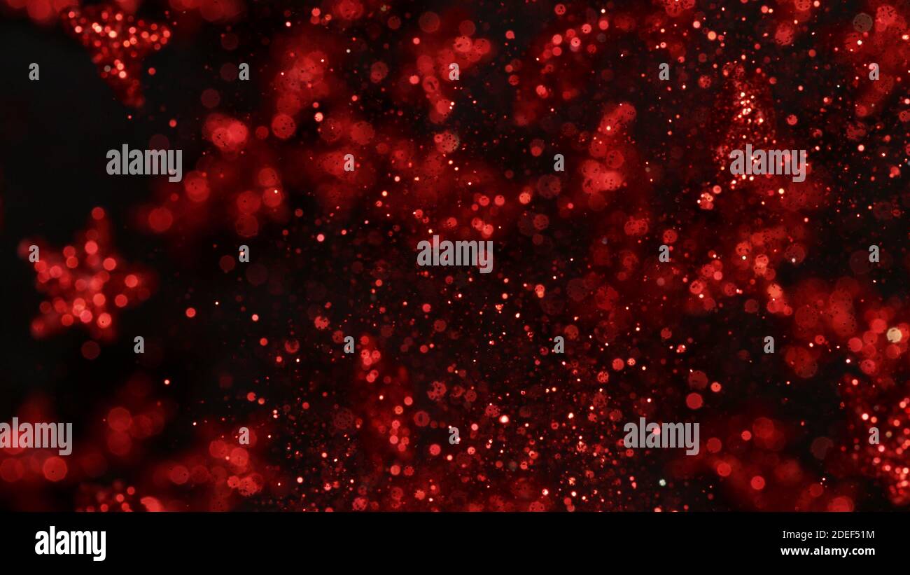 Red stars flying up in the air, abstract background Stock Photo - Alamy