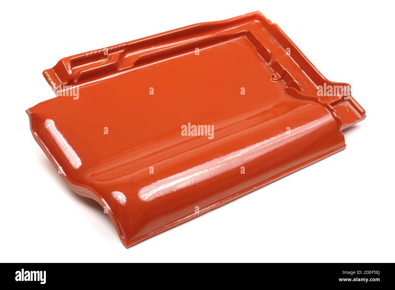 Single new shinny red roof tile isolated on the white background Stock ...