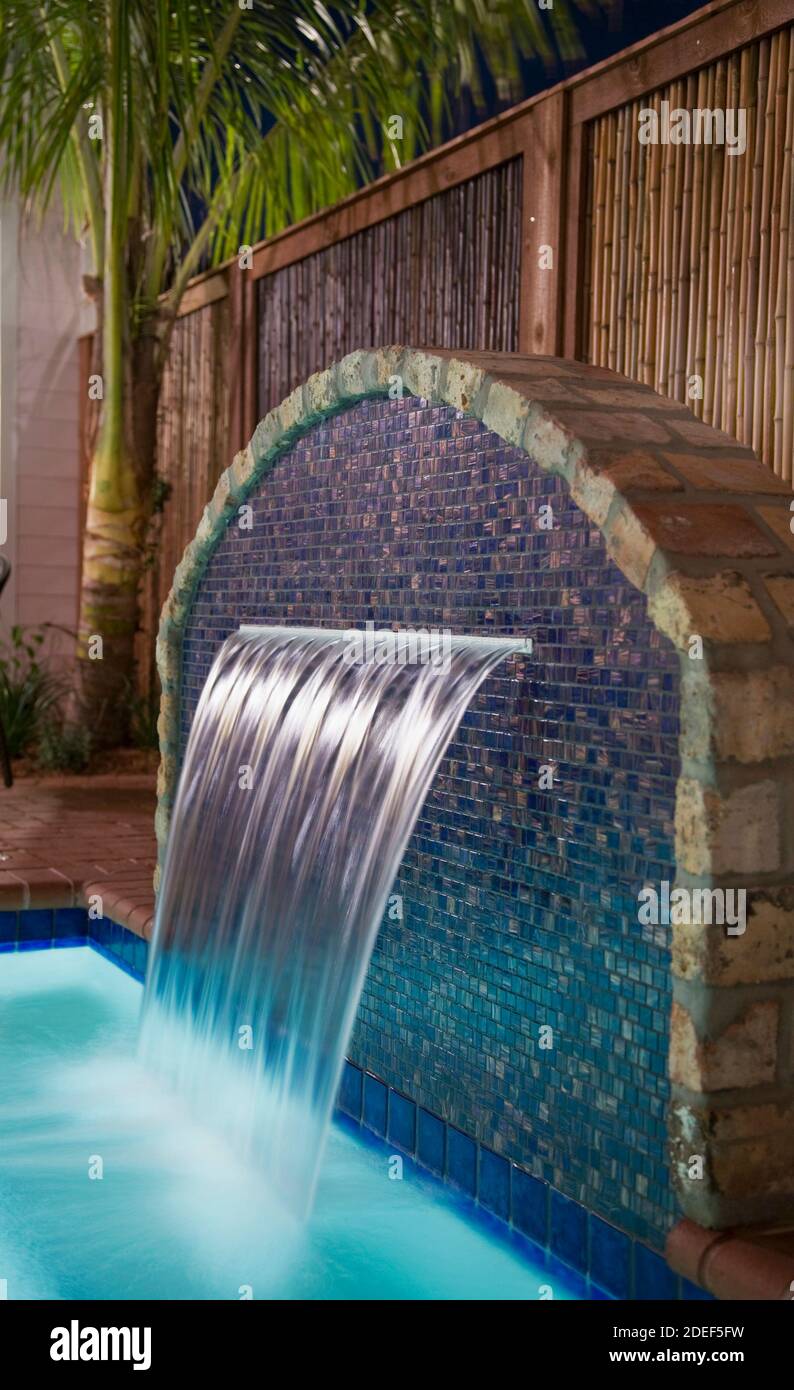 Water Fall in Swimming Pool Stock Photo - Alamy