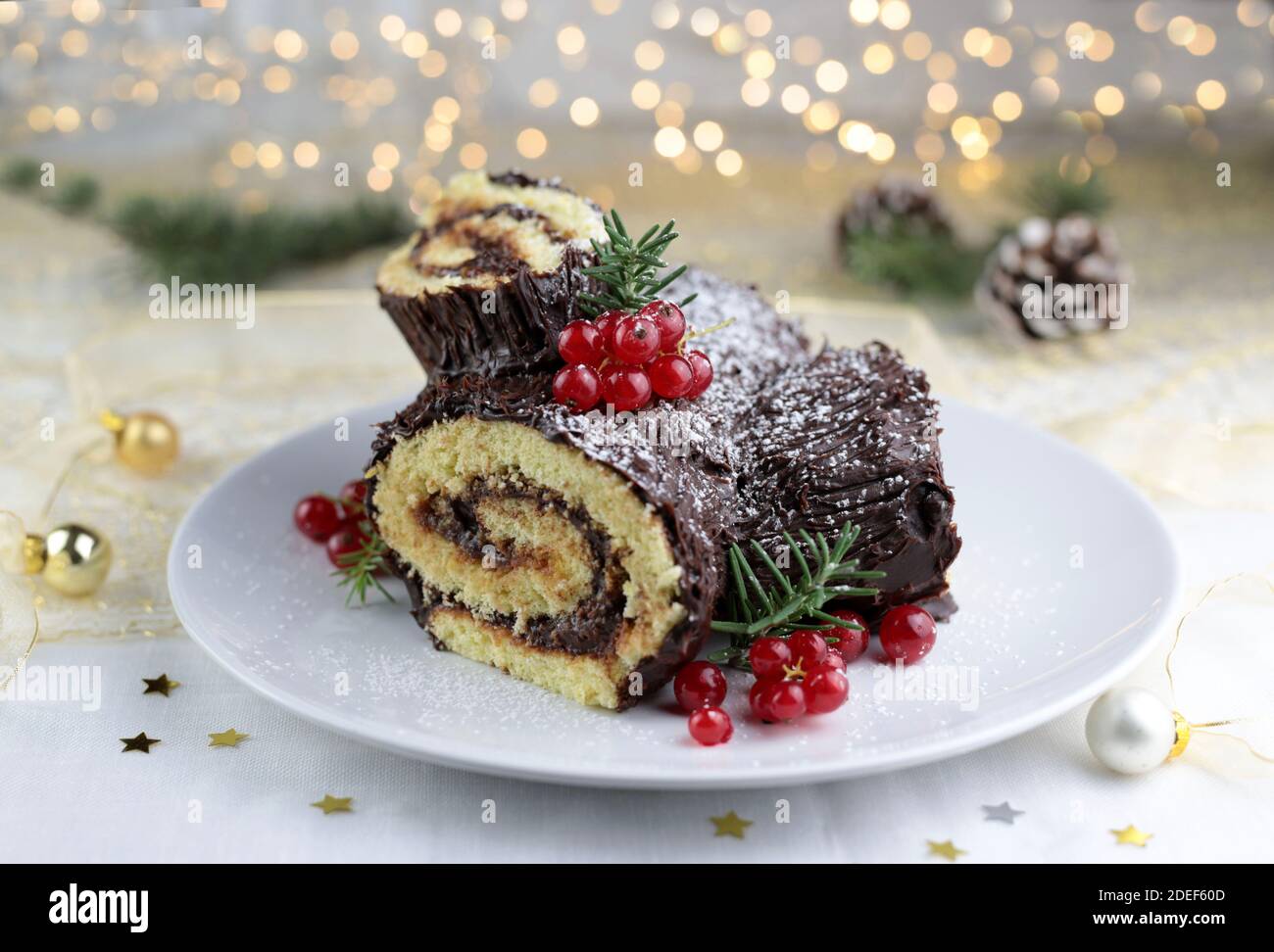 Chocolate Christmas Yule Log, Buche de Noel on white background ...