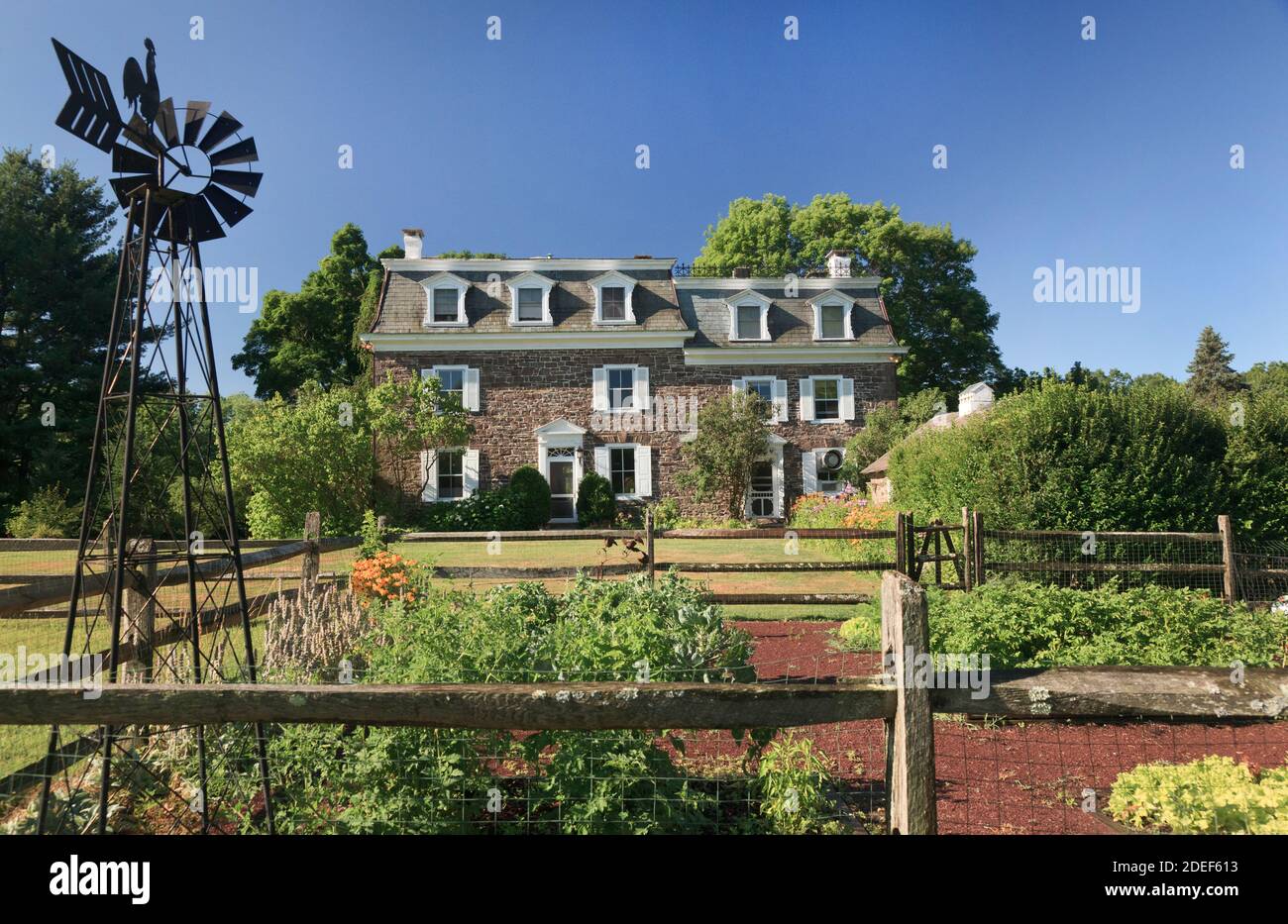 Colonial stone home on a farm Stock Photo - Alamy