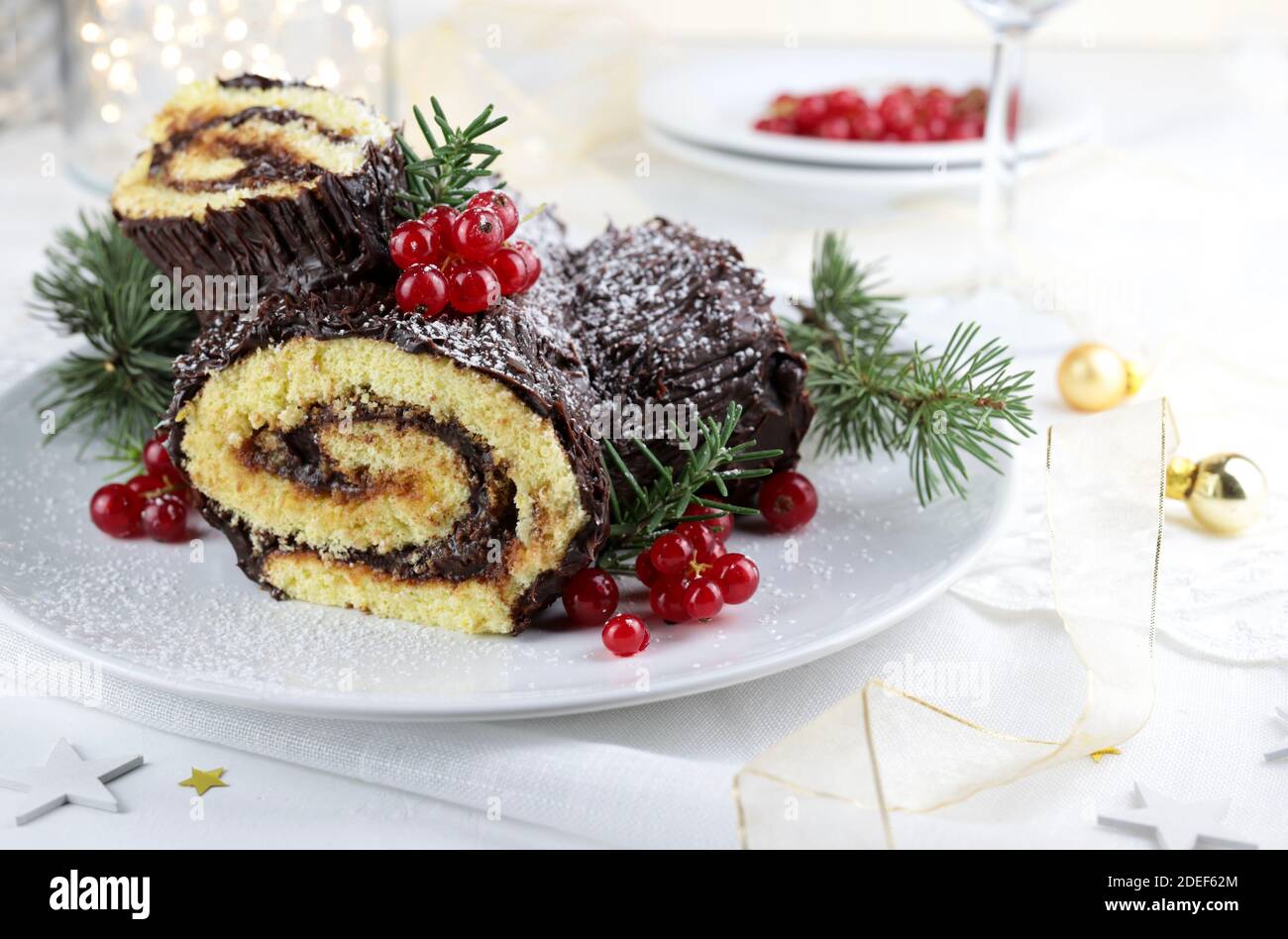 Chocolate Christmas Yule Log, Buche de Noel on white background ...