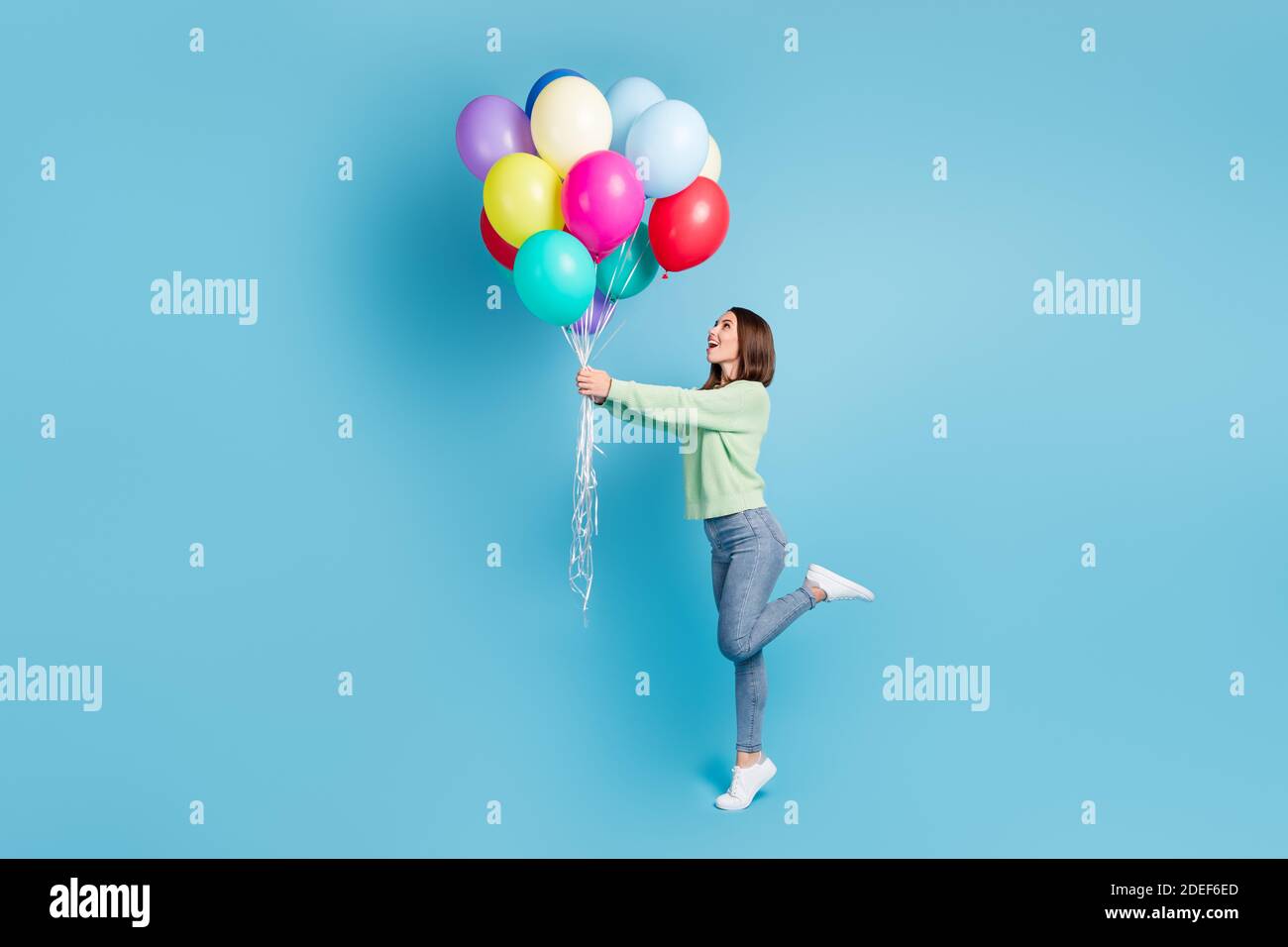 Full length body size side profile photo of cheerful happy girl looking ...