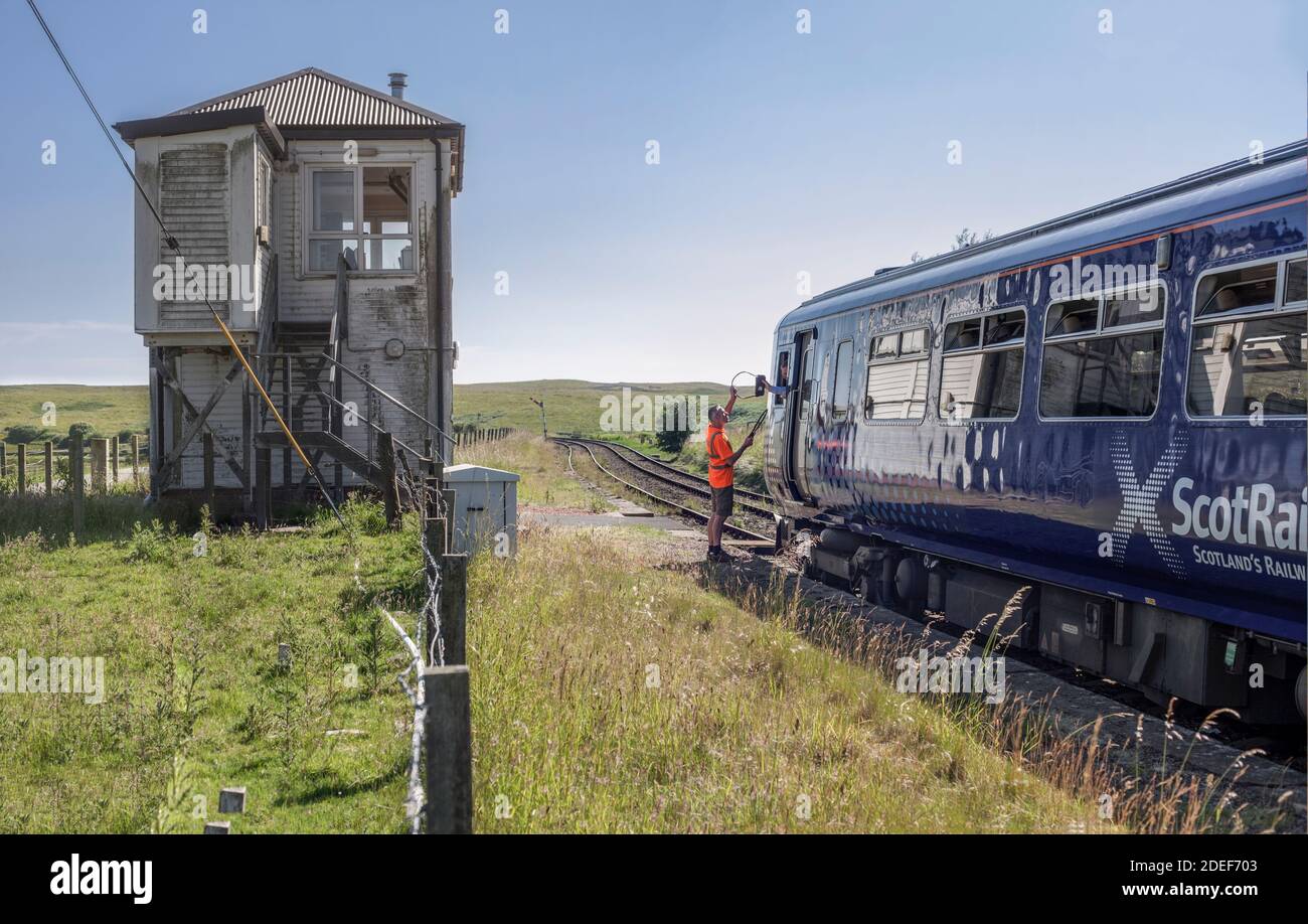 Glenwhilly Network Rail signaller exchanging single line tokens with ...