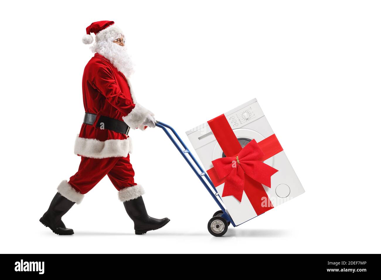 Full length portrait of a santa claus pushing a washing machine with a ...